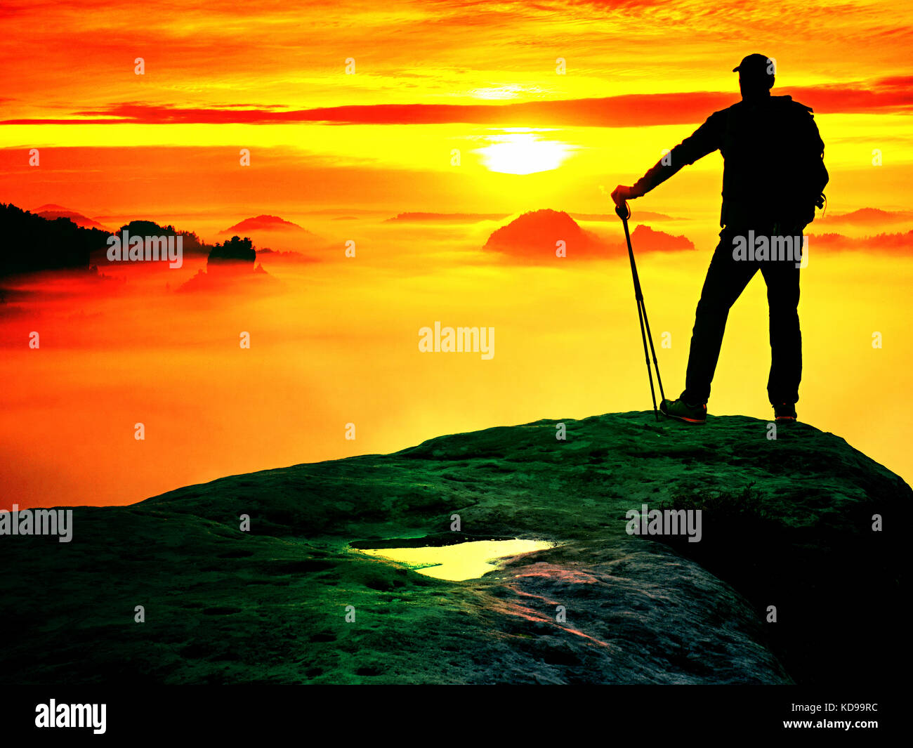Lens defect. Man silhouette with poles in hand. Sunny spring daybreak ...