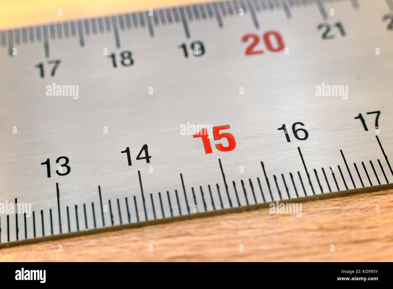 A fragment of metal measuring ruler with centimeter and millimeter ...