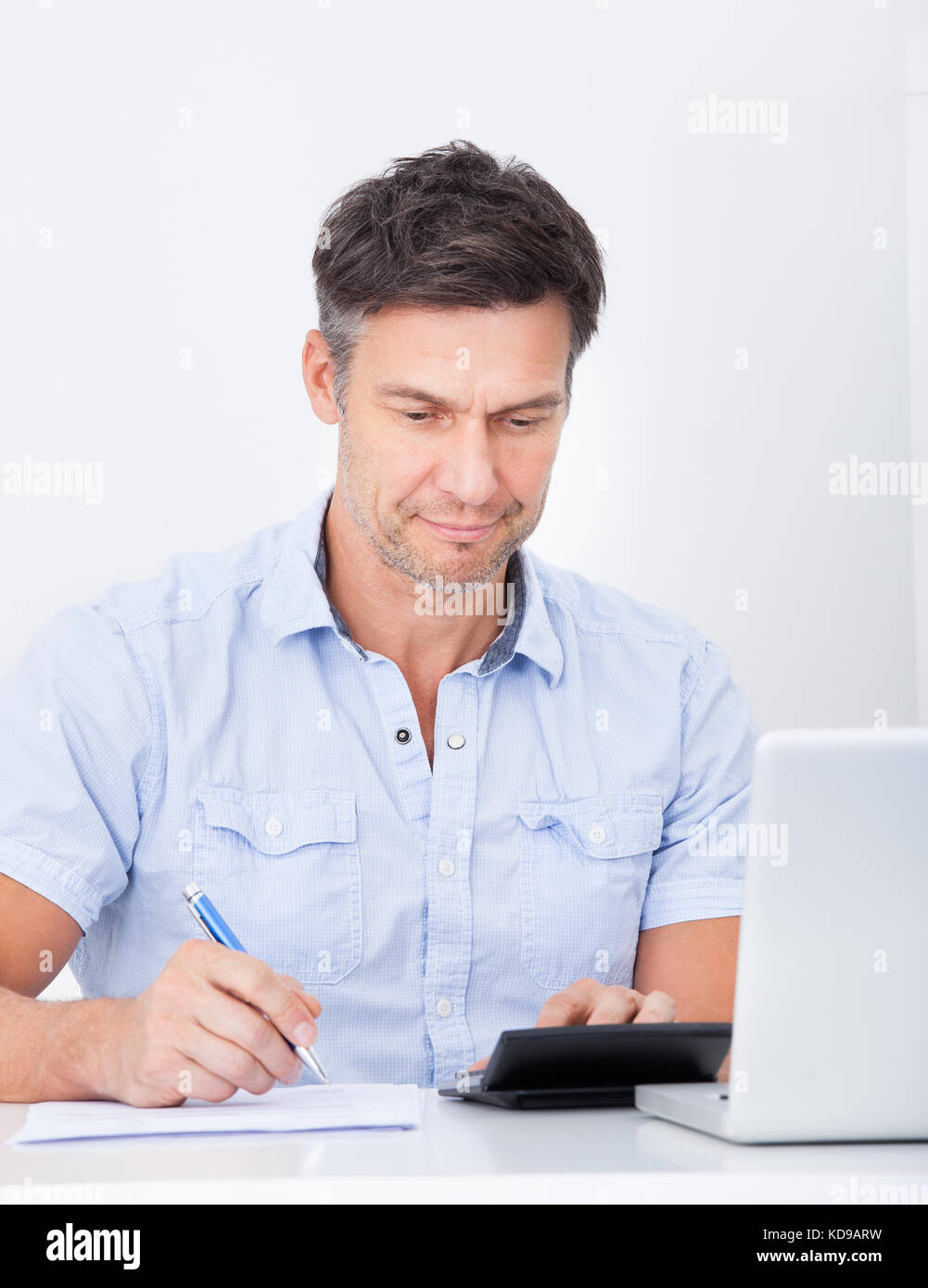 Calculating business documents hi-res stock photography and images - Alamy