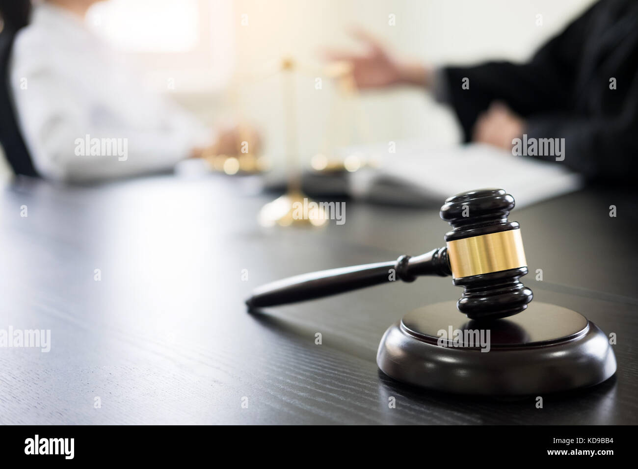 Judge gavel with lawyers advice legal at law firm in background. Concepts of law, services Stock ...