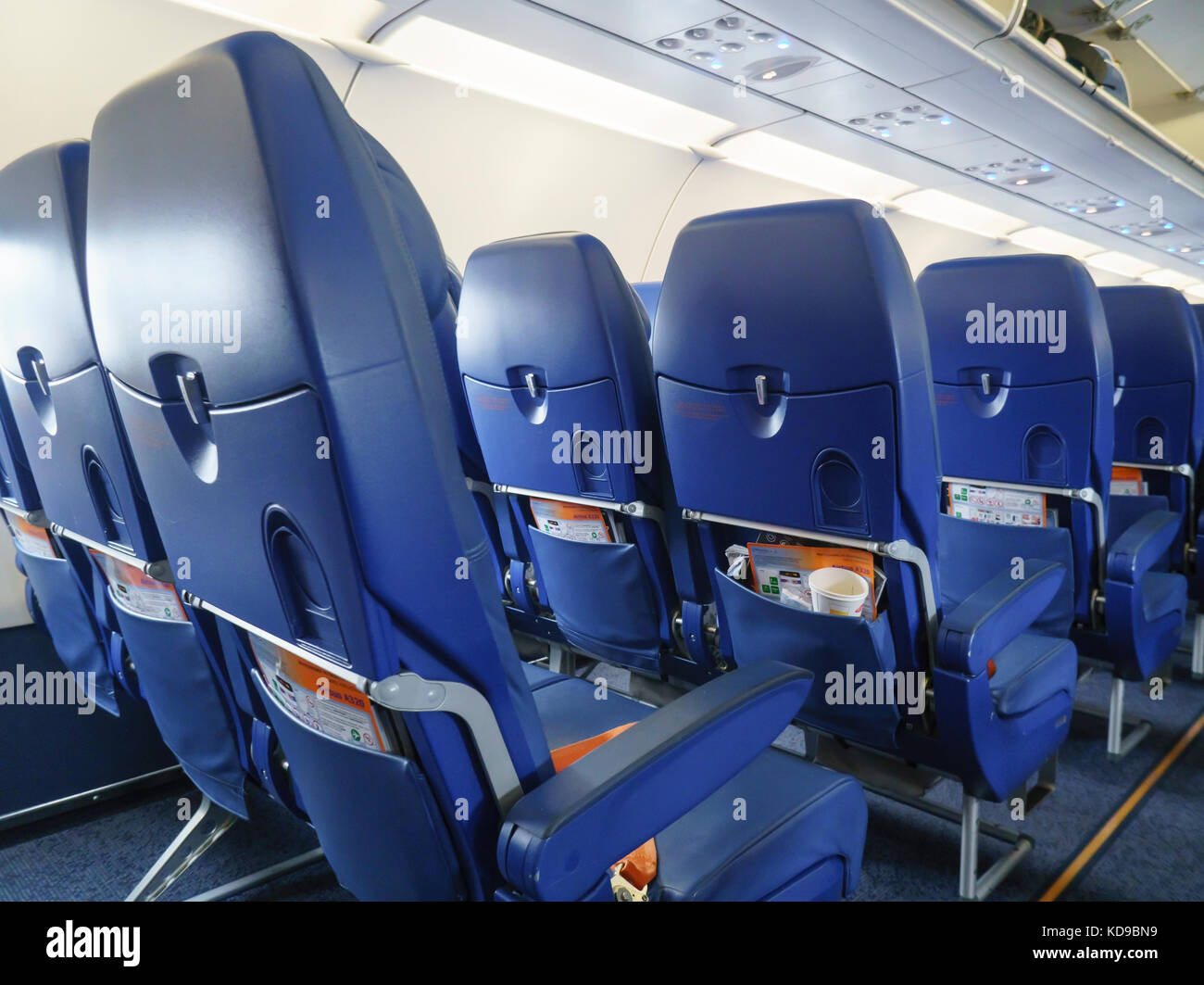 Chairs in the plane Stock Photo - Alamy