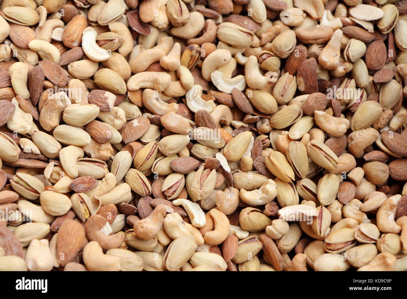 Dried fruit background: nuts, cashews, pistachios and almonds Stock ...