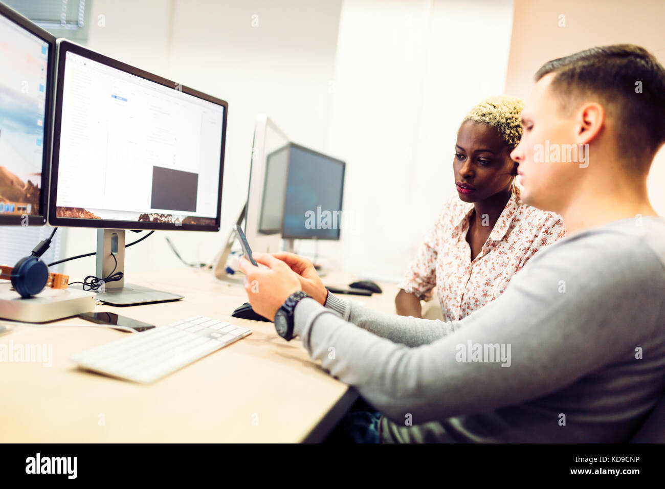 Software engineers working on project and programming in company Stock ...