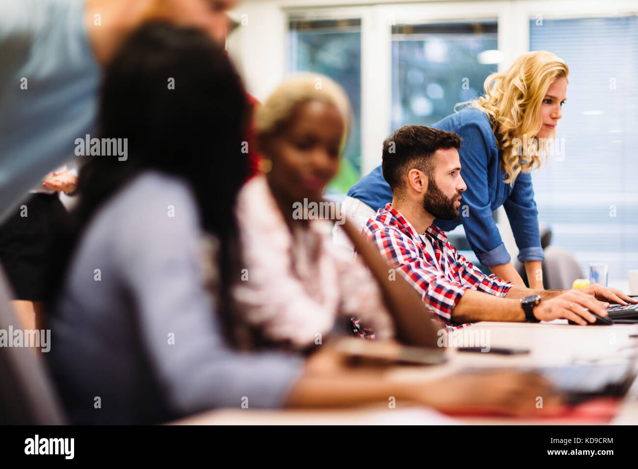 Software engineers working on project and programming in company Stock Photo - Alamy