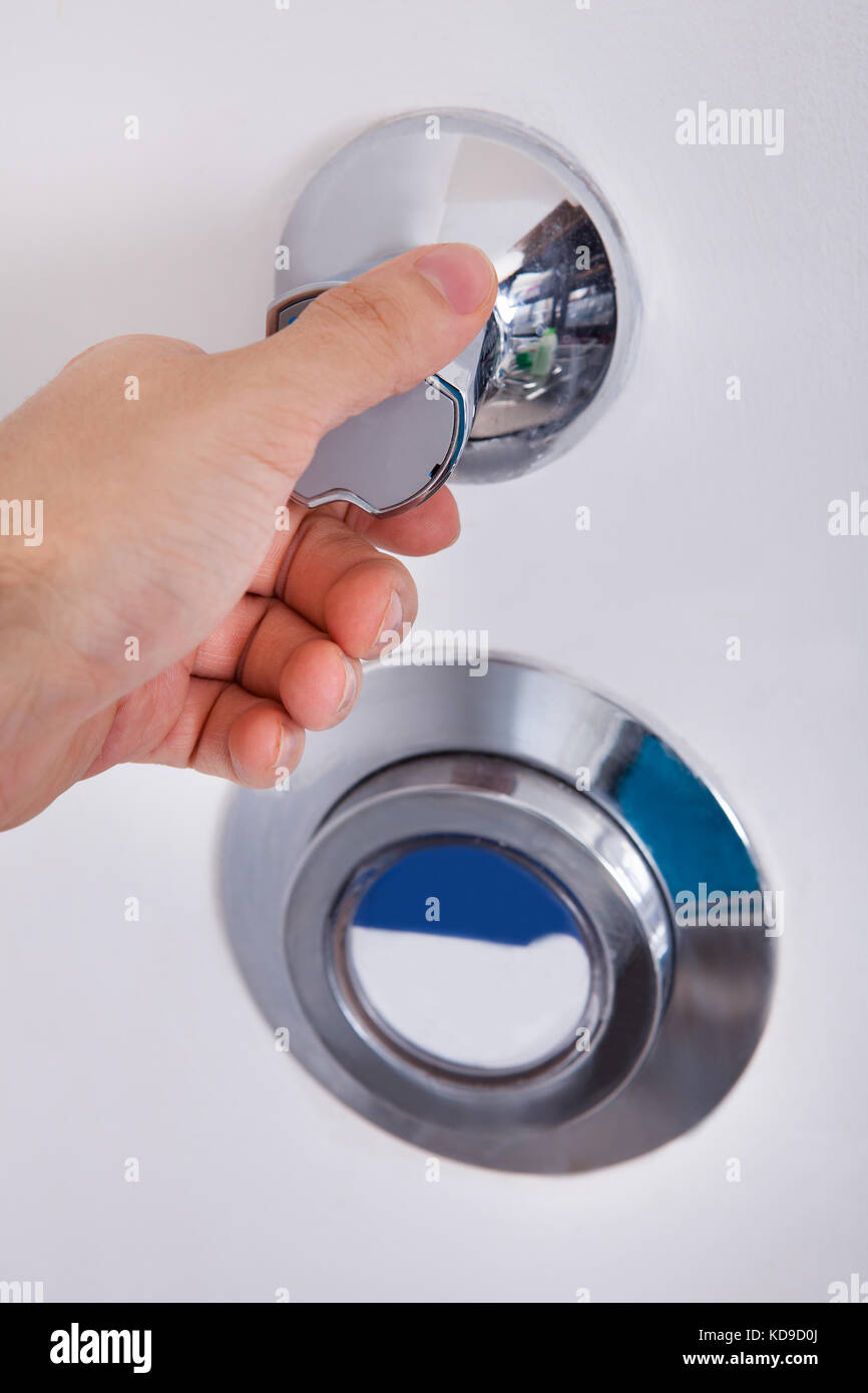 Close-up Of Human Hand Adjusting Water Meter Stock Photo - Alamy