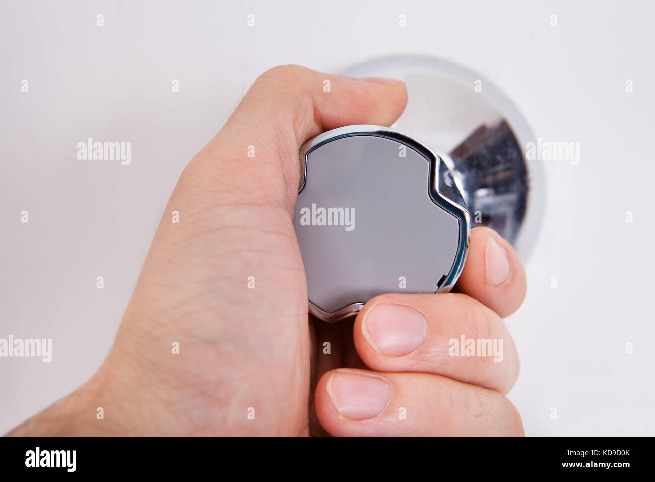 Close-up Of Human Hand Adjusting Water Meter Stock Photo - Alamy