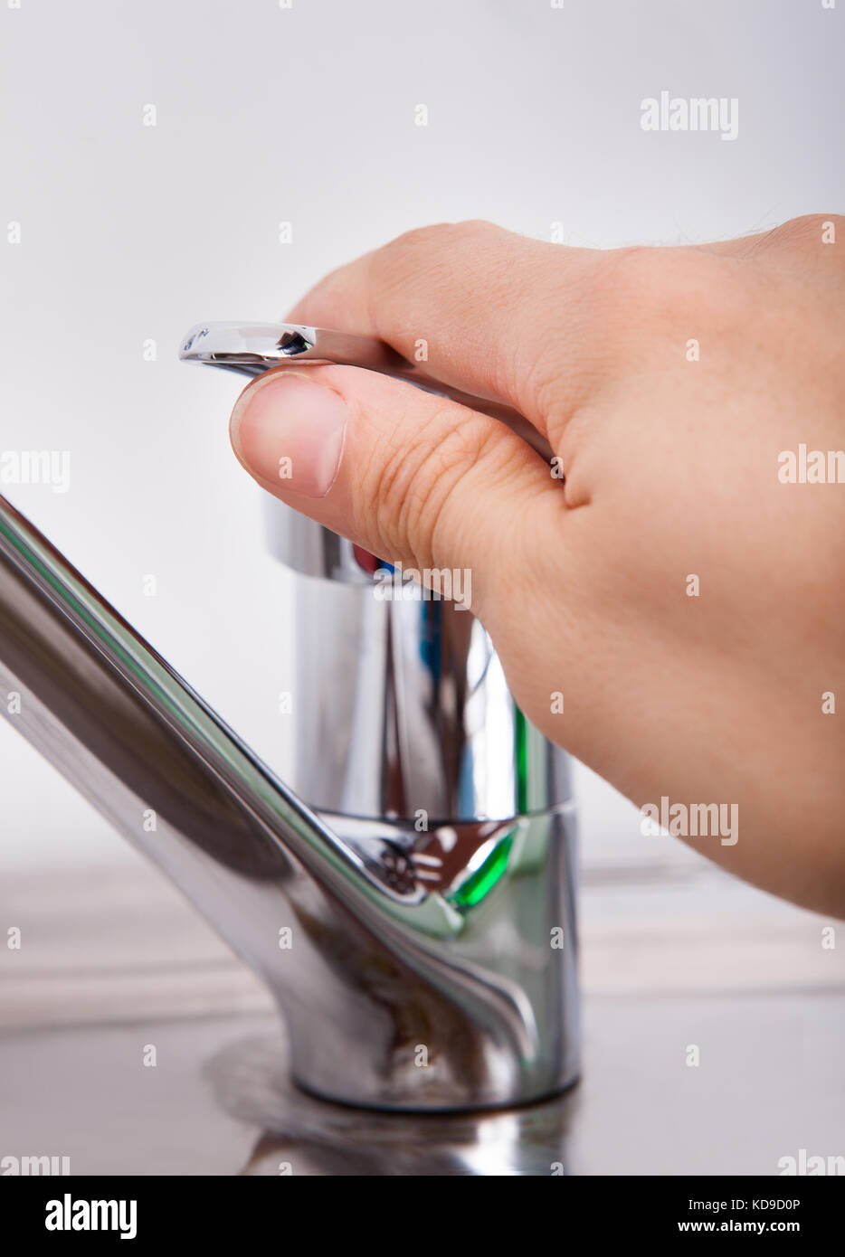 Close-up Of Hand Opening Chrome Water Tap Stock Photo - Alamy