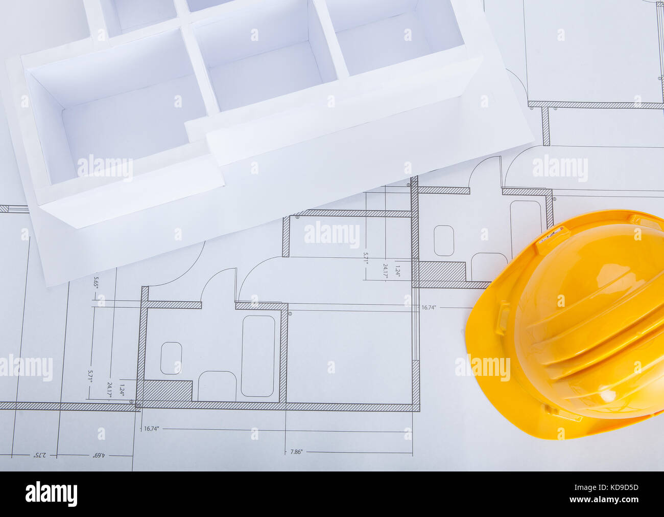 Model of house and architectural blueprints hi-res stock photography ...