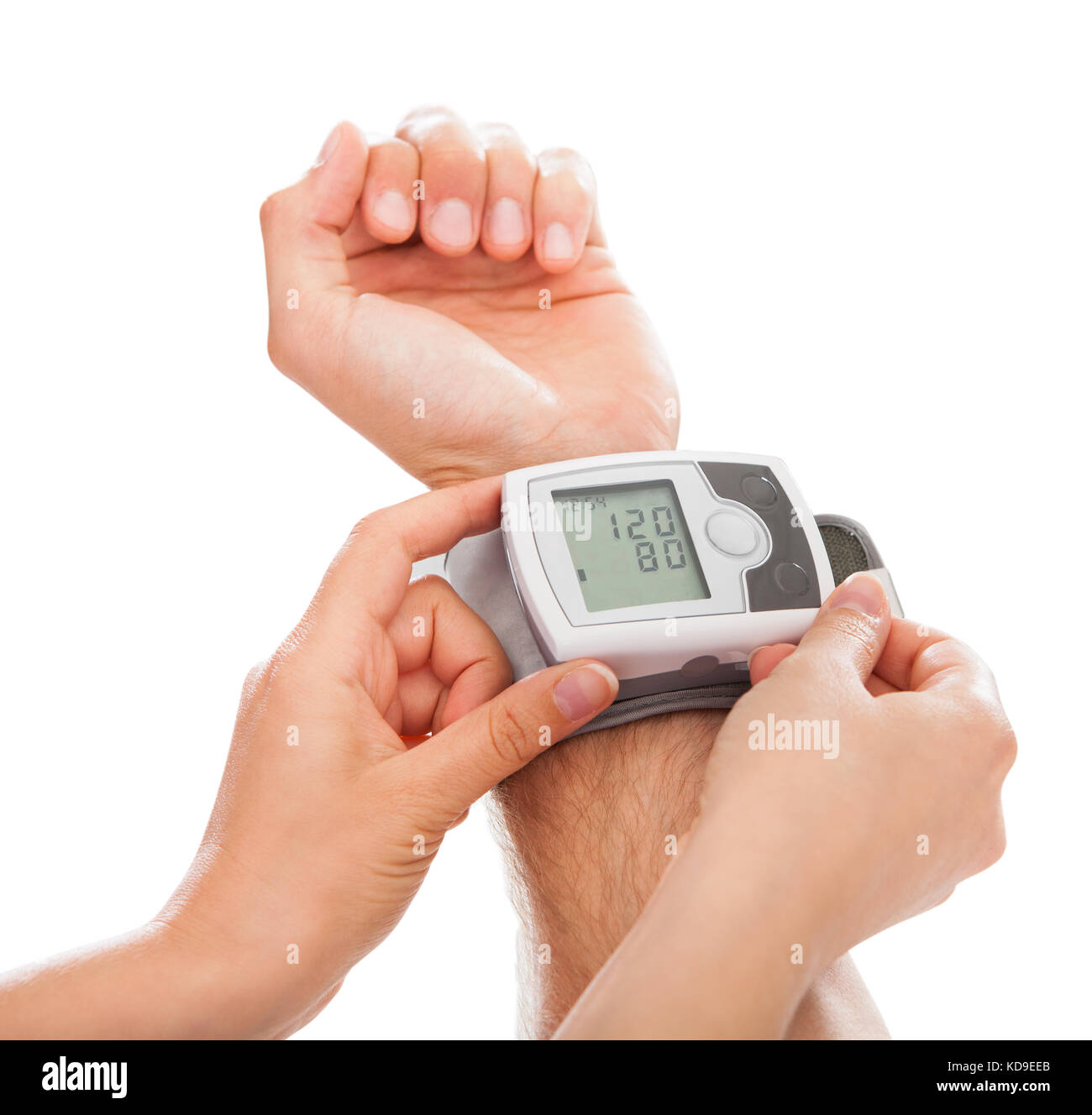 Beautiful doctor checking patients blood pressure in examination room ...