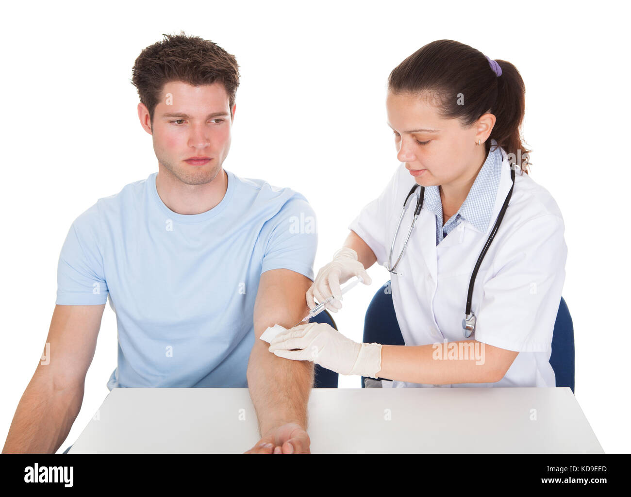 Young Female Doctor Injecting Vaccine To Patient Stock Photo - Alamy