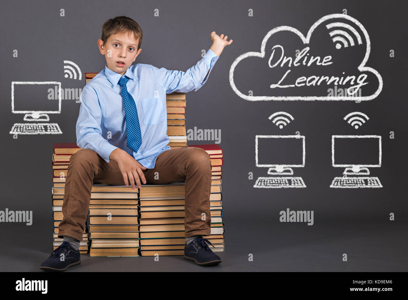 Online education concept. The young engineer demonstrates the principle ...