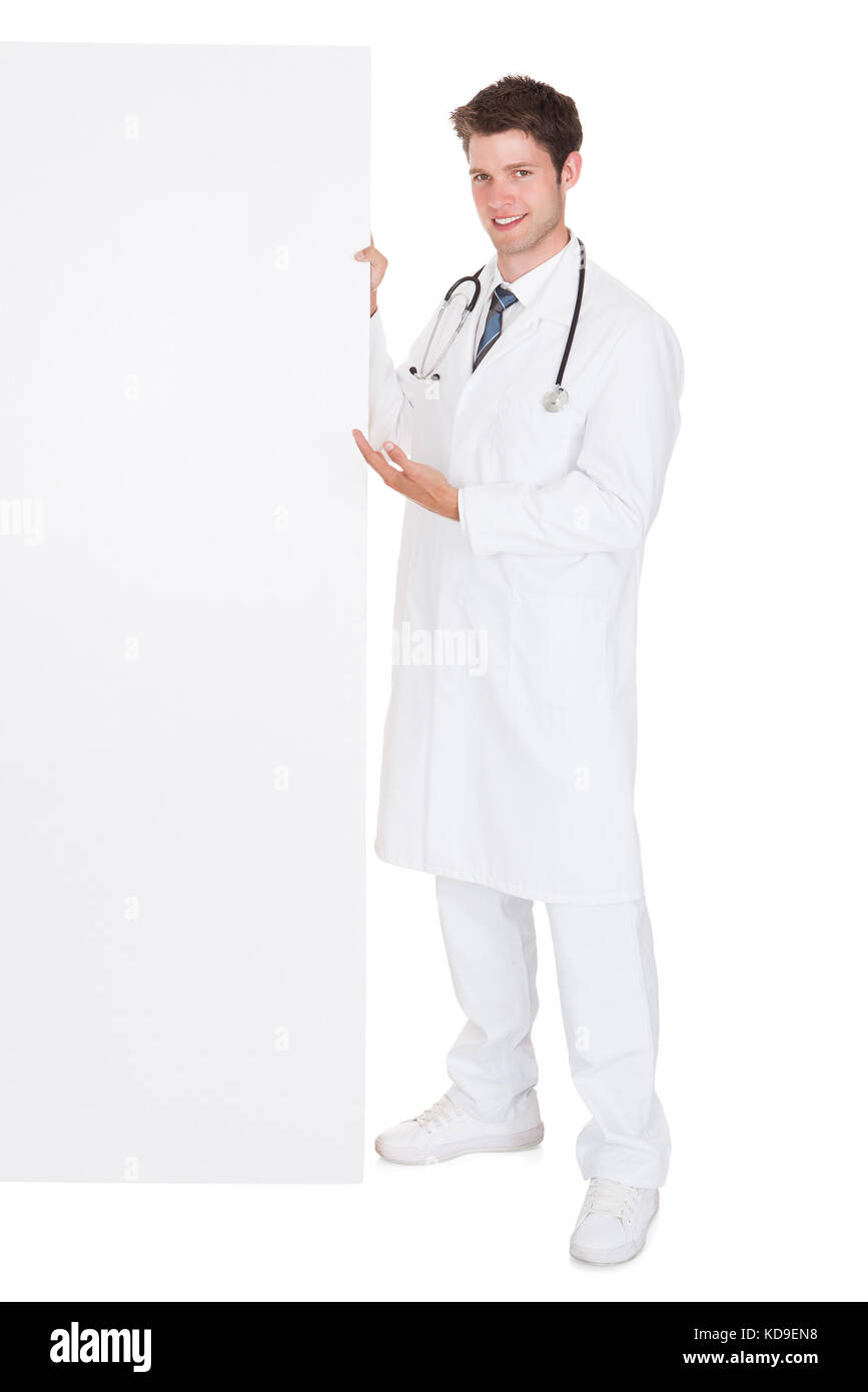 Portrait Of A Male Doctor With Empty Banner Stock Photo - Alamy