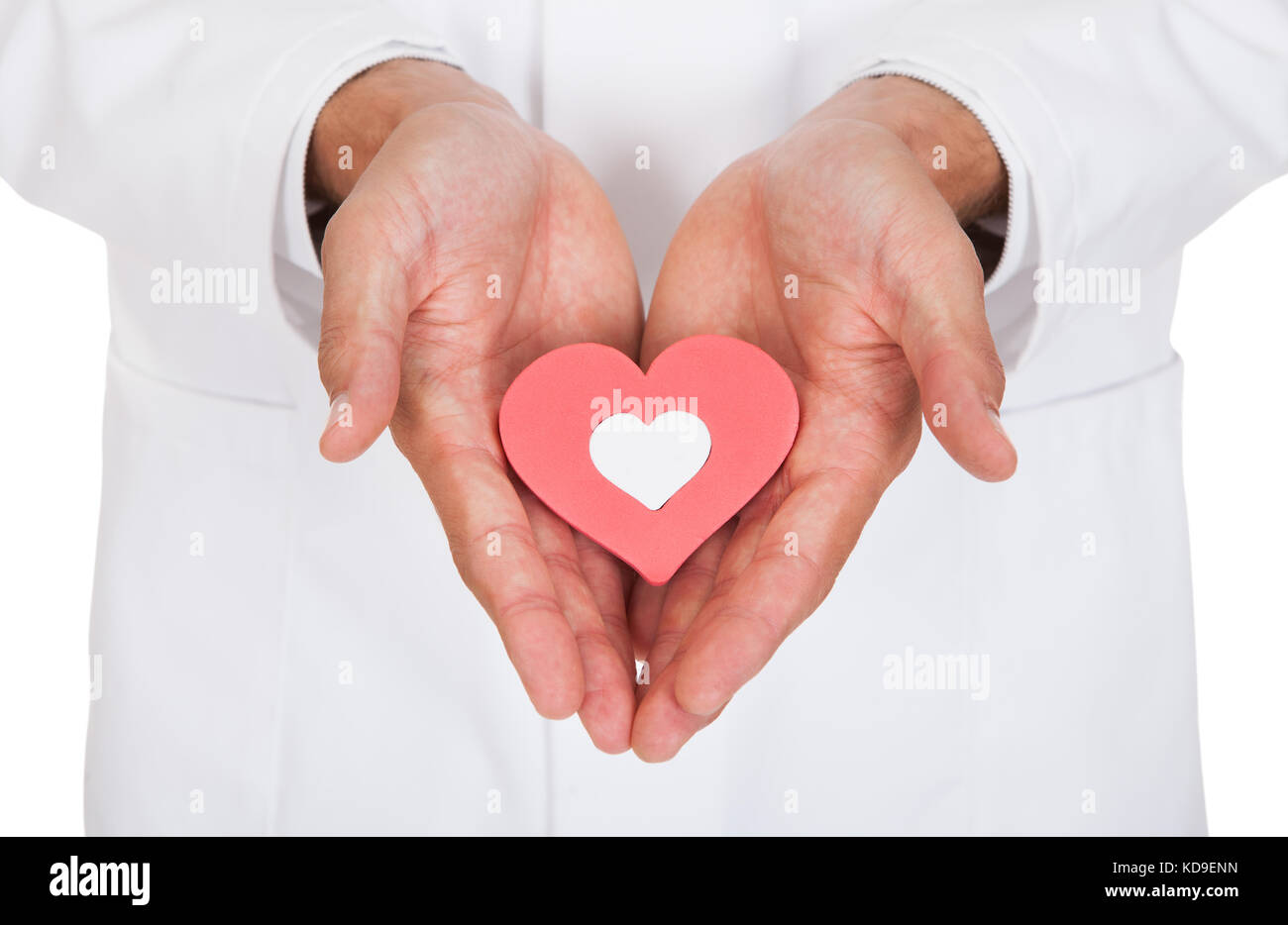 Close-up Of Doctor Holding Heart Shape Symbol Stock Photo - Alamy