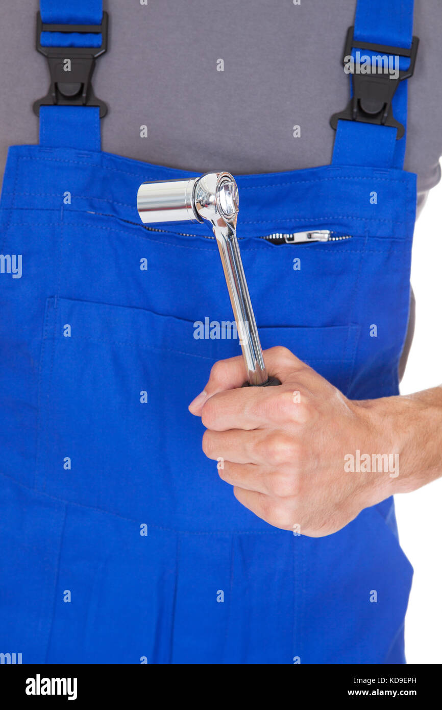 Close-up Photo Of Mechanic Hand Holding Ratchet Stock Photo - Alamy