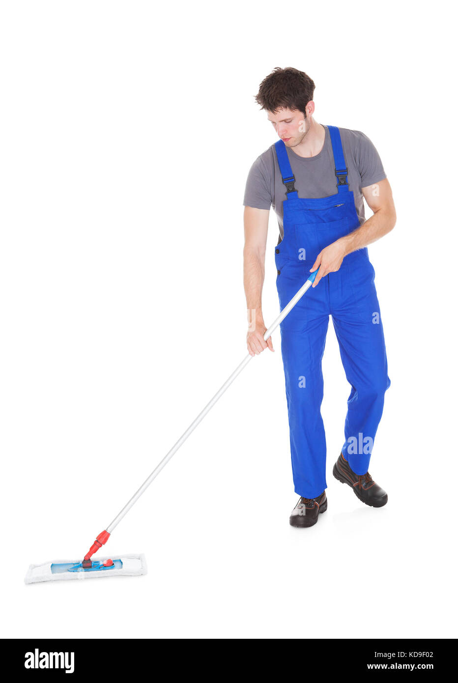 Man sweeping floor Cut Out Stock Images & Pictures - Alamy