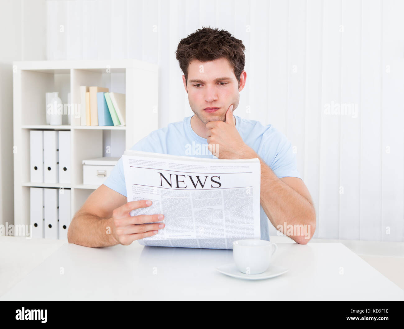 Newspaper model hi-res stock photography and images - Alamy
