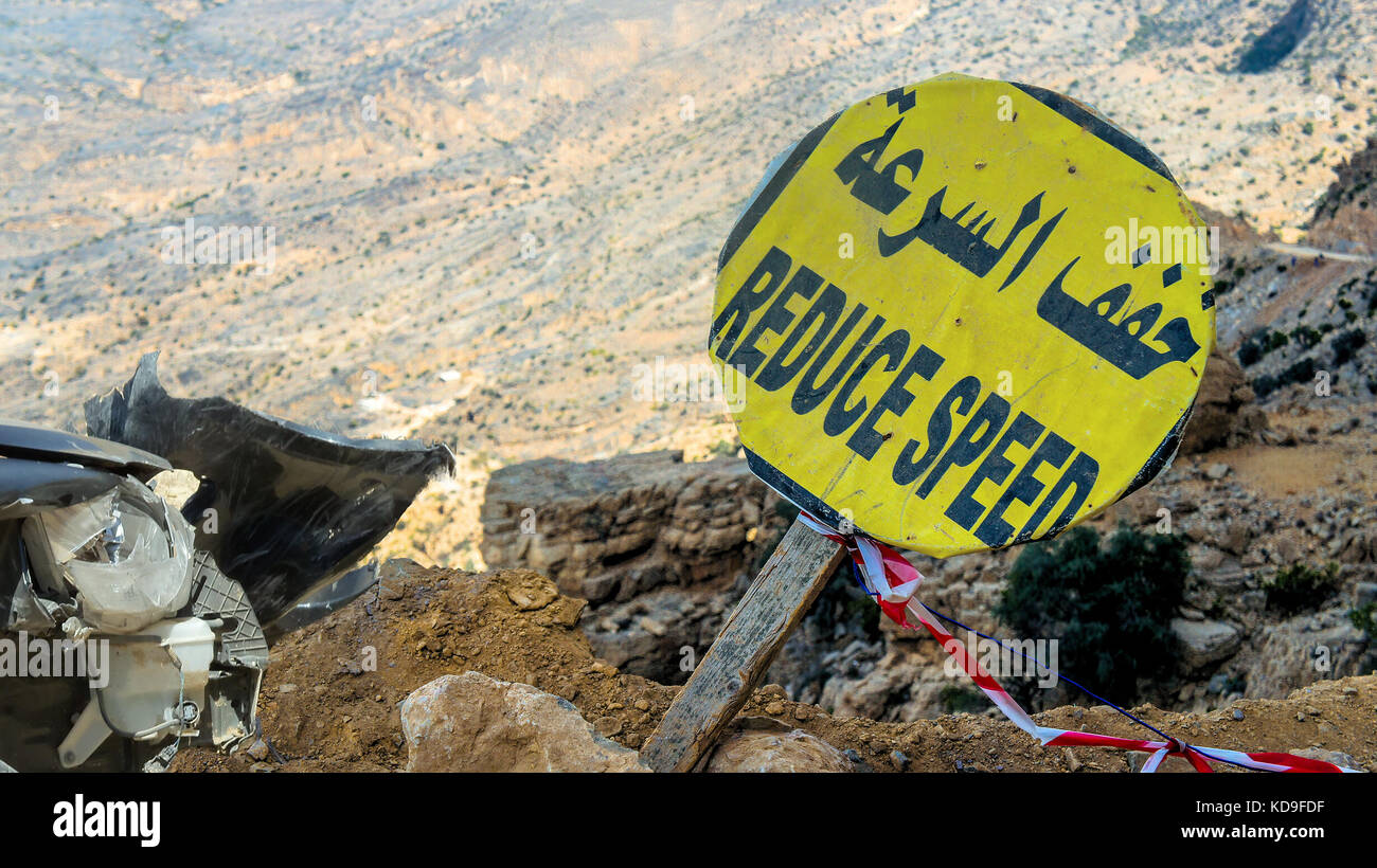 Oman, sign "Reduce speed", Arabic, accident car recognizable Stock ...