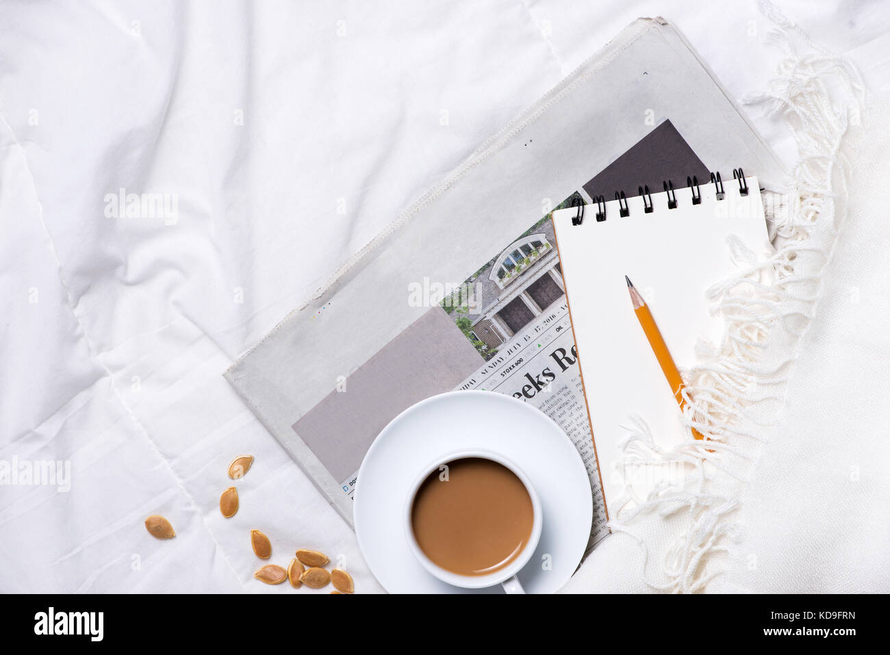 Morning Coffee and Diary with wooden pencil on cloth top view, woman ...