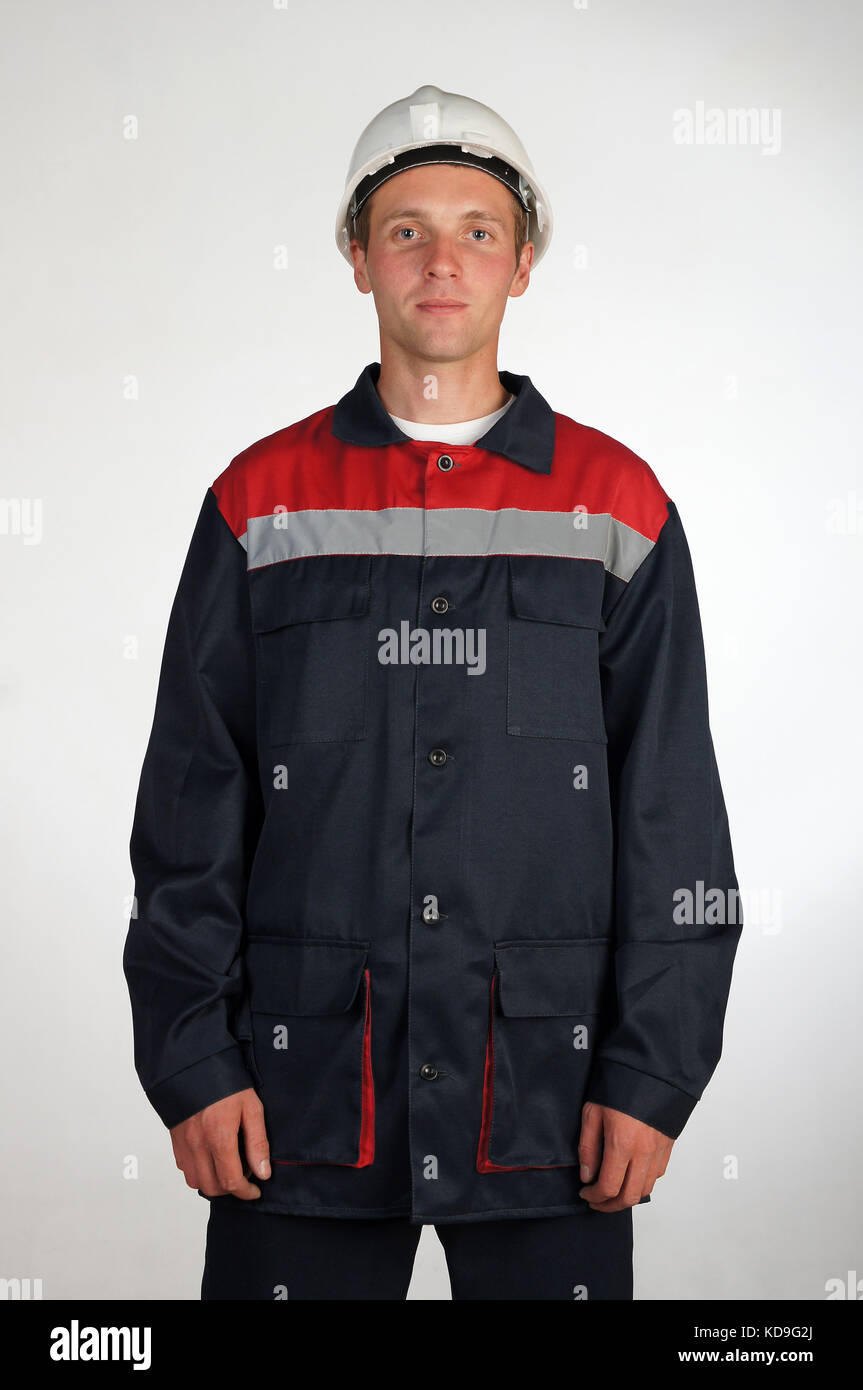 A man in overalls and work wear.Isolated studio portarit Stock Photo ...