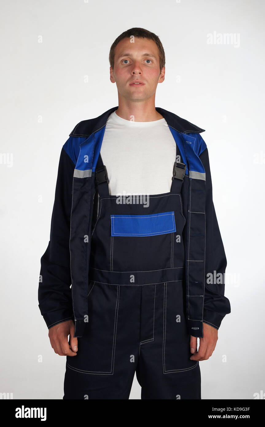A man in overalls and work wear.Isolated studio portarit Stock Photo ...
