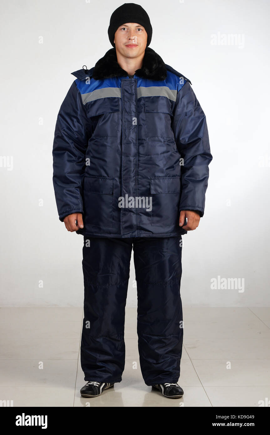 A man in overalls and work wear.Isolated studio portarit Stock Photo ...