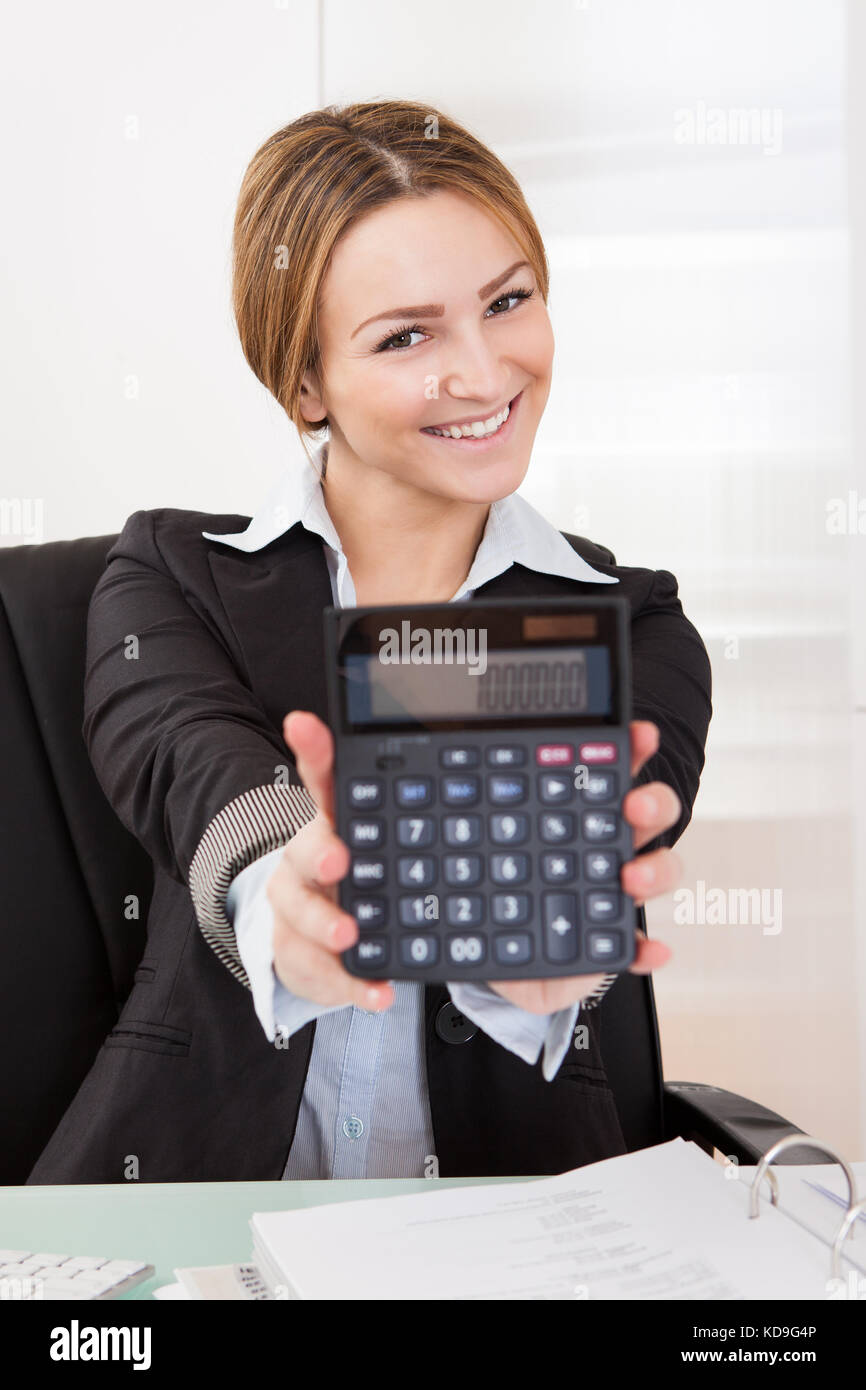 Young people work calculator hi-res stock photography and images - Alamy