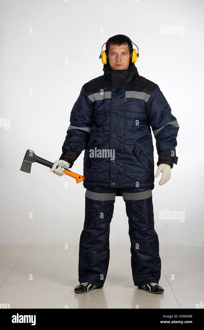 A man in overalls and work wear.Isolated studio portarit Stock Photo ...