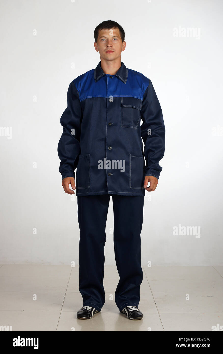 A man in overalls and work wear.Isolated studio portarit Stock Photo ...