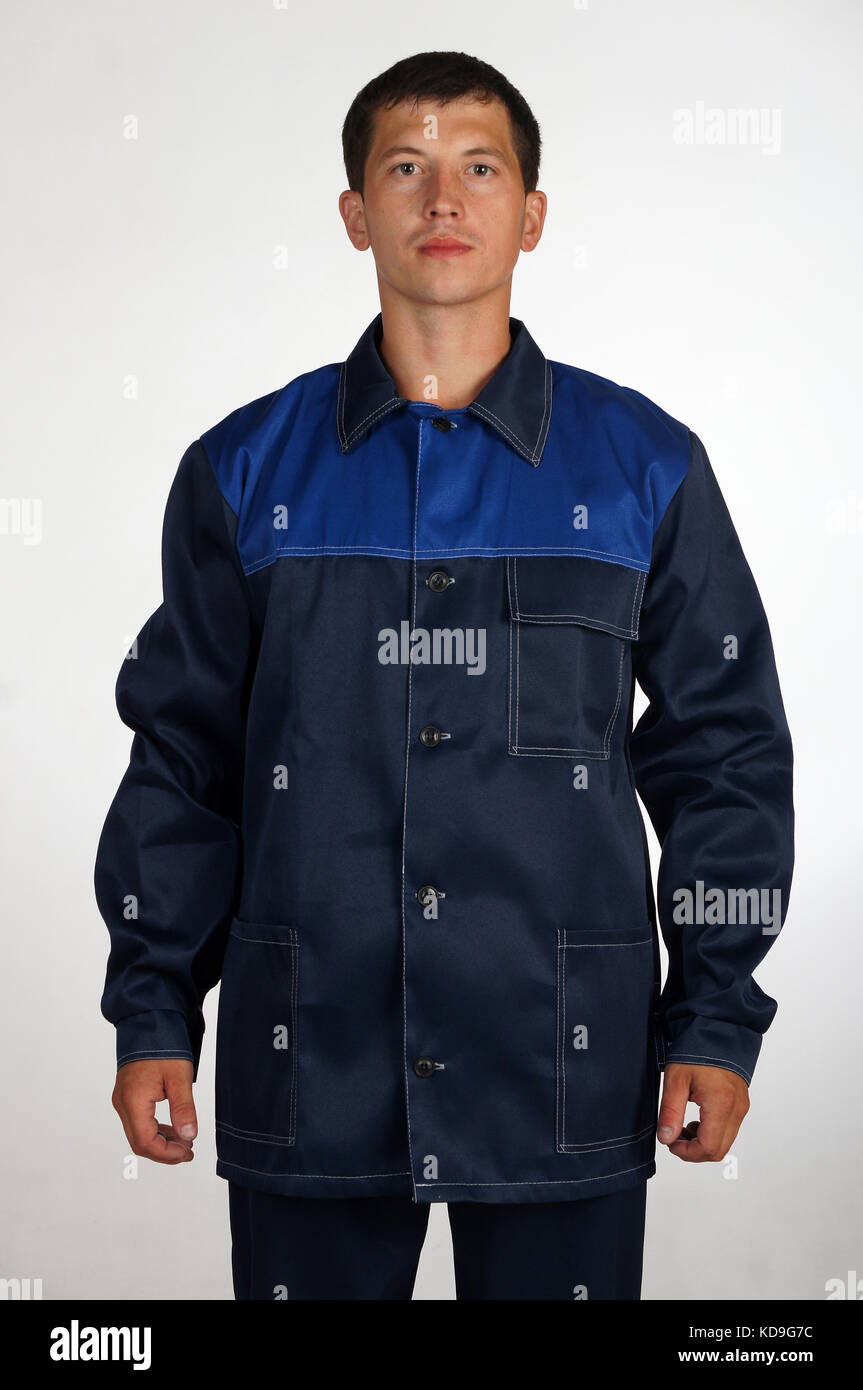 A man in overalls and work wear.Isolated studio portarit Stock Photo ...