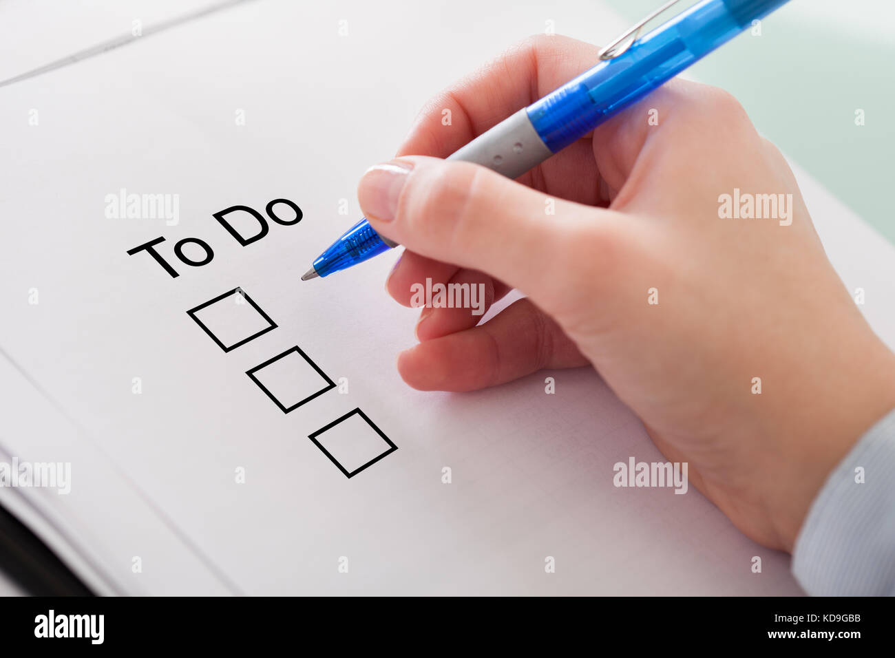Close-up Of Hand Planning To Do List Stock Photo - Alamy