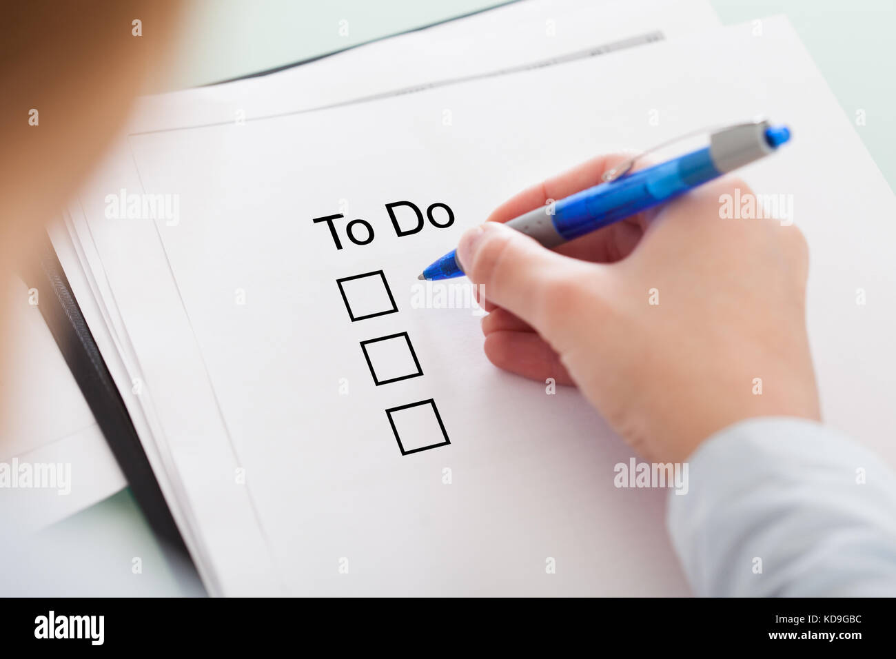 Close-up Of Hand Planning To Do List Stock Photo - Alamy