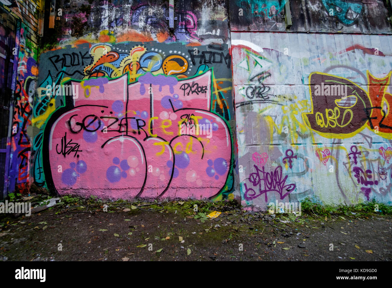 A multi painted graffiti wall Stock Photo - Alamy