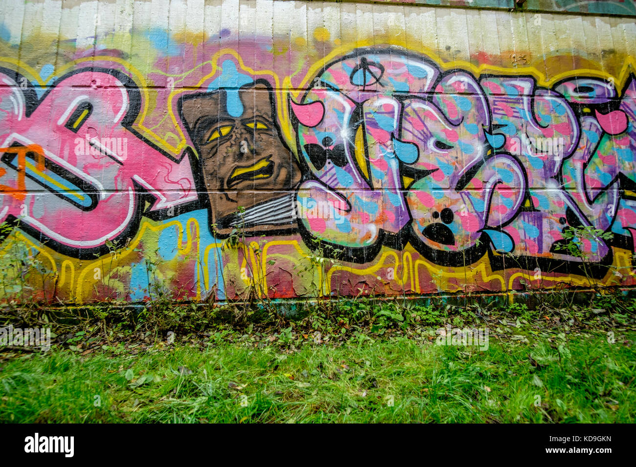 A multi painted graffiti wall Stock Photo - Alamy