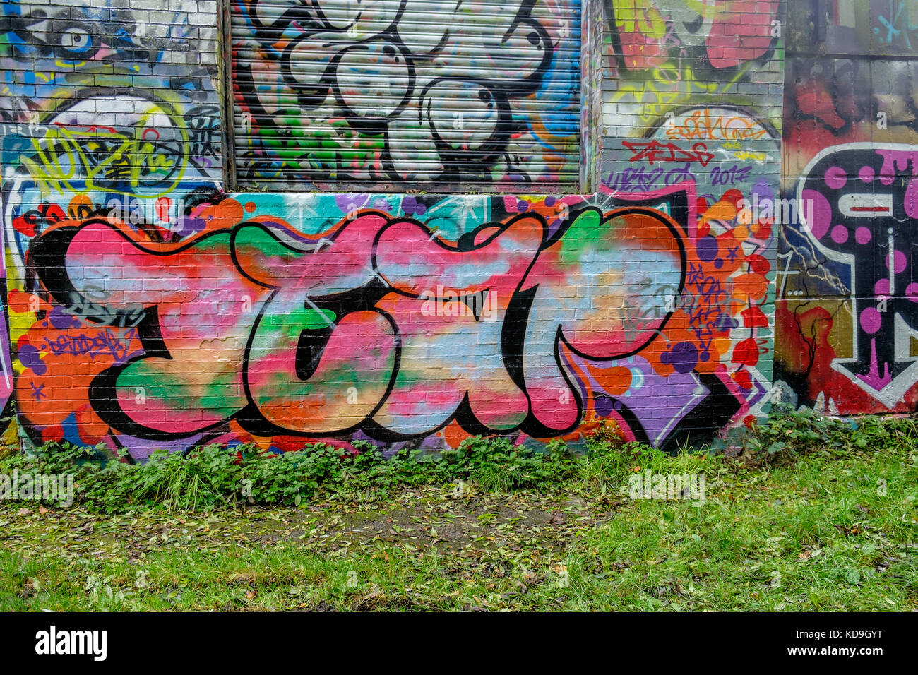 A multi painted graffiti wall Stock Photo - Alamy