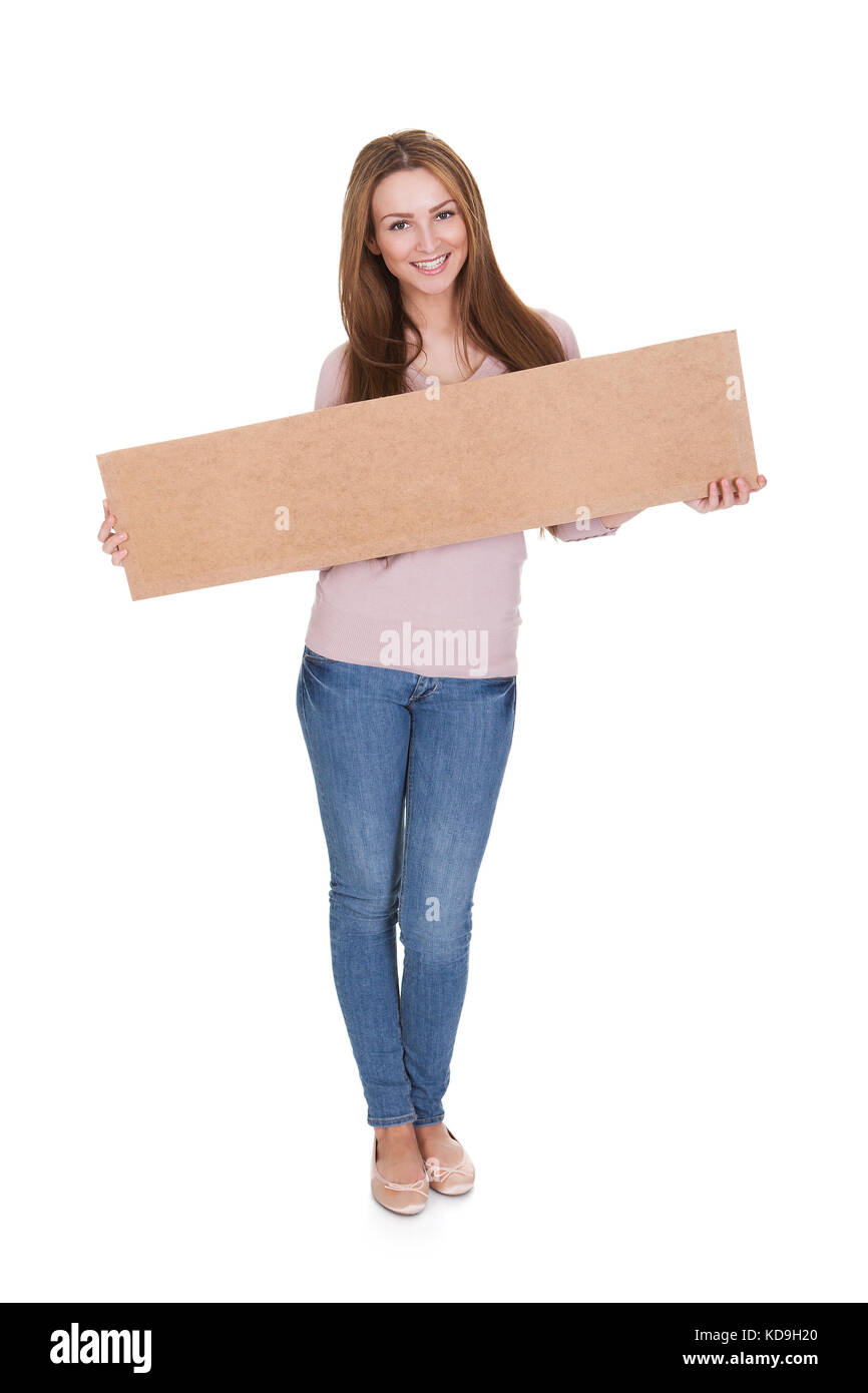 Young Woman Holding Placard Over White Background Stock Photo - Alamy Young Woman Holding Placard Over White Background Stock Photo - Alamy