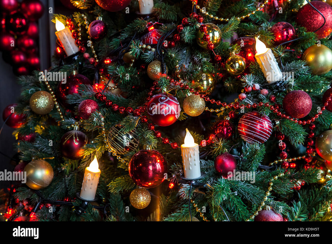 Green New Year tree decorated Stock Photo - Alamy