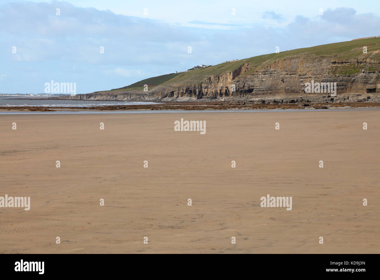 Dunraven Bay with a low tide showing vast expanses of sandy beach with ...