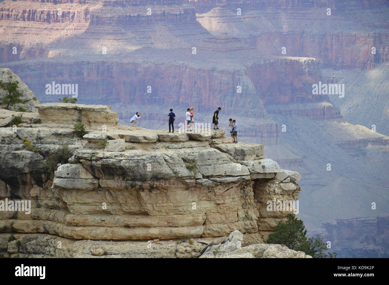 A group of people in grand canyon Stock Photo - Alamy