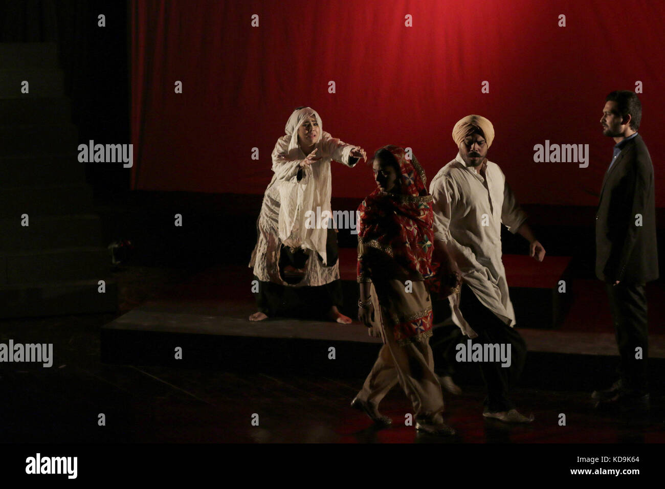 Pakistani artist performing on the stage during a drama titled 'Kaun ...