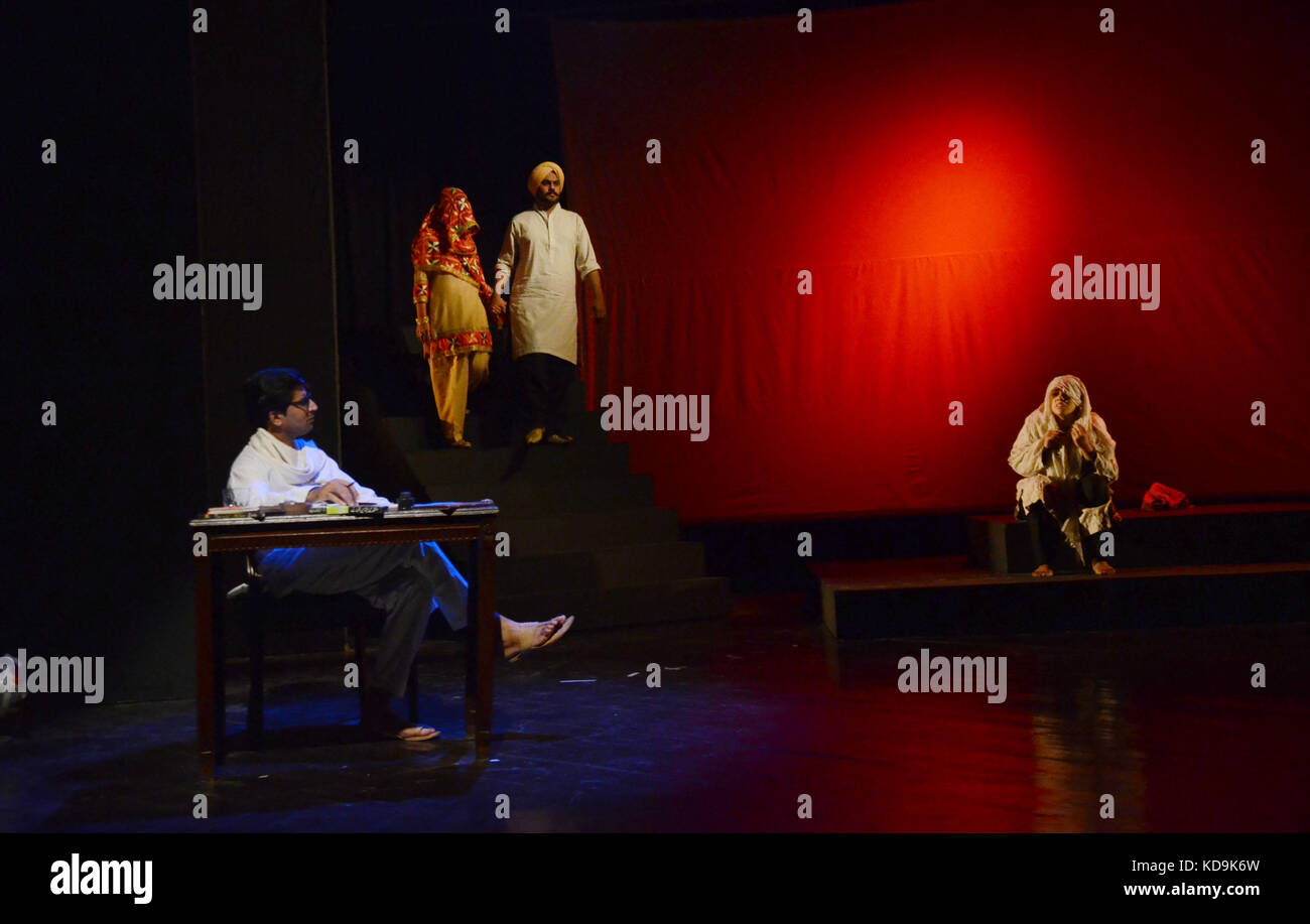 Pakistani artist performing on the stage during a drama titled 'Kaun ...