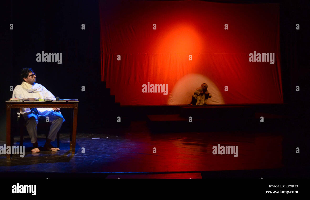Pakistani artist performing on the stage during a drama titled 'Kaun ...