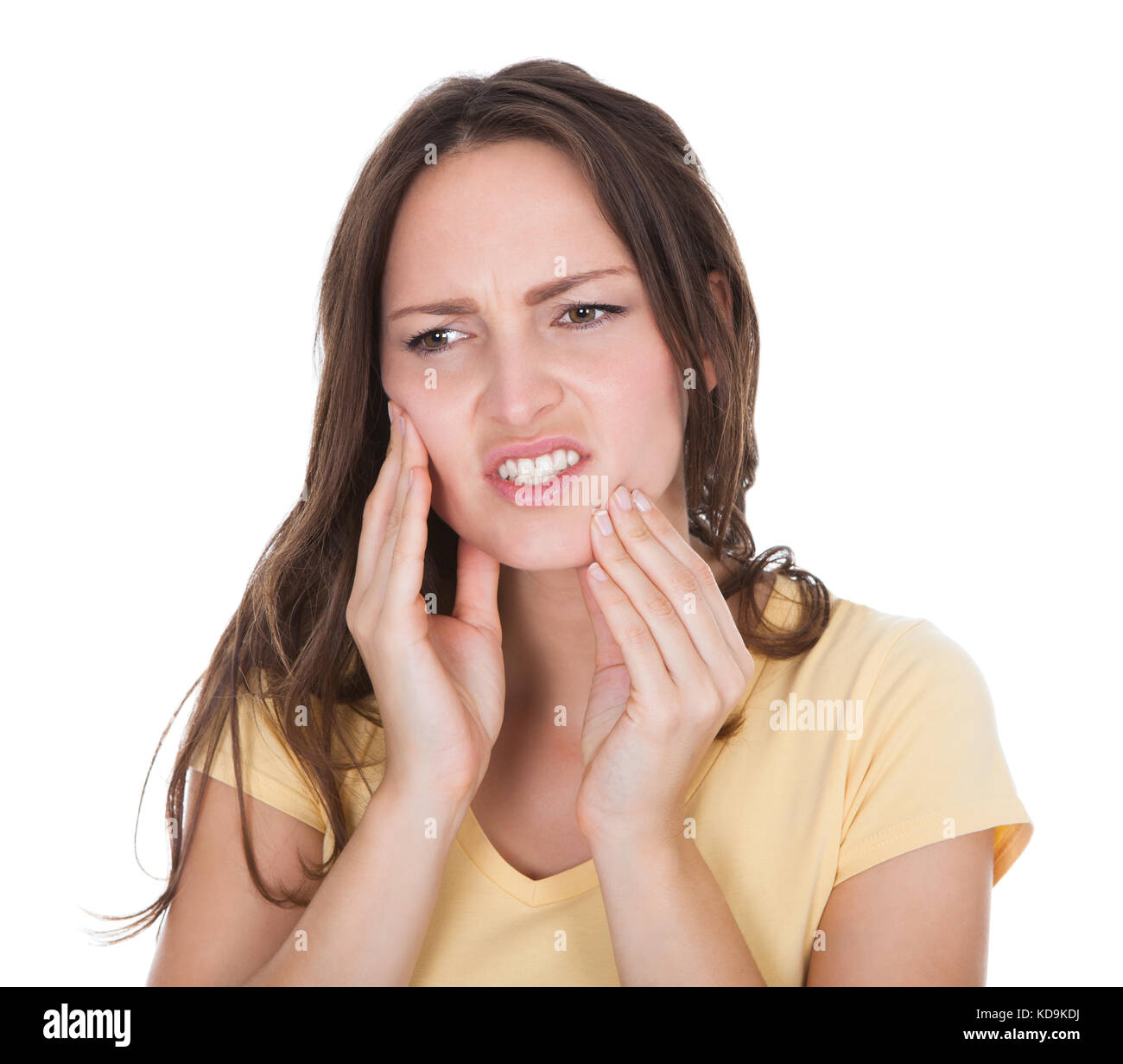 Close-up Of A Young Woman Suffering From Toothache Over White ...