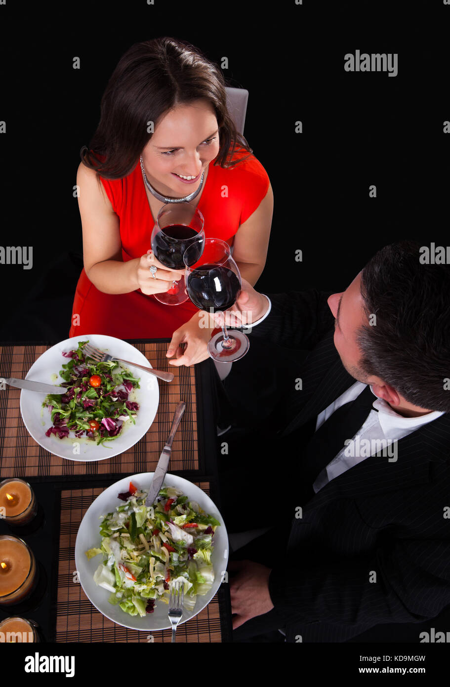 Man male woman female couple food eating table hi-res stock photography ...