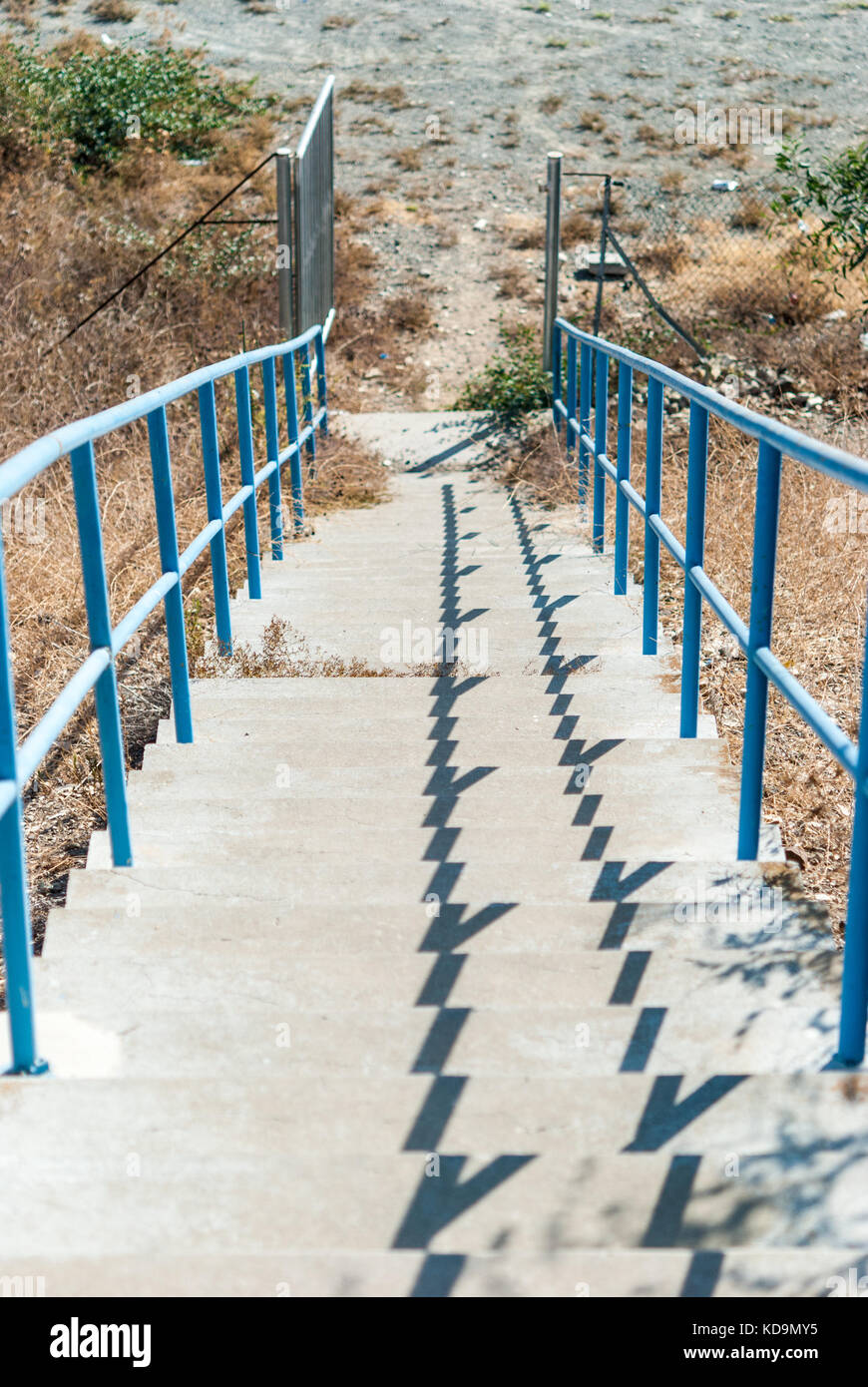 Dry dam escape blue stairs Stock Photo - Alamy