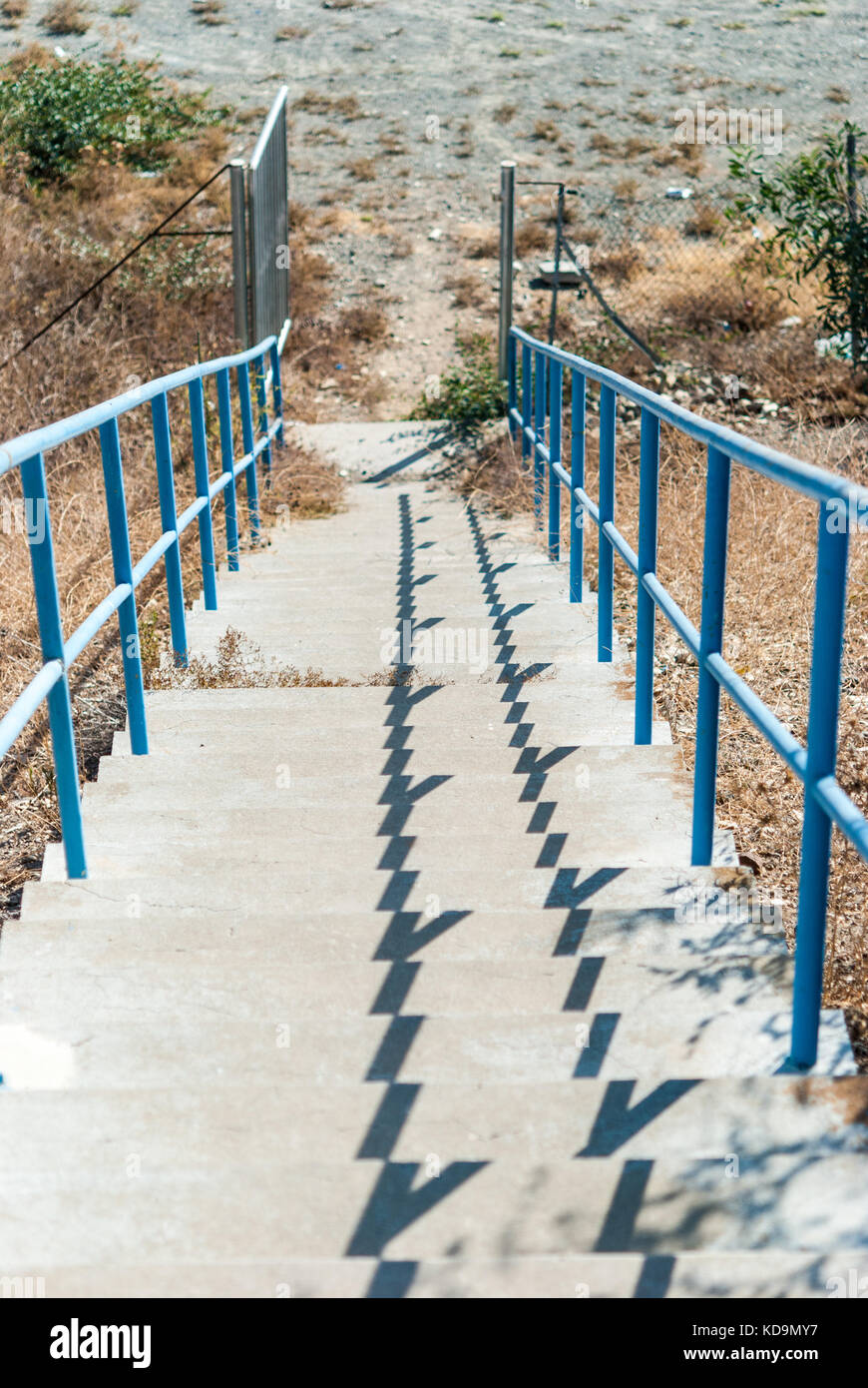 Dry dam escape blue stairs Stock Photo - Alamy
