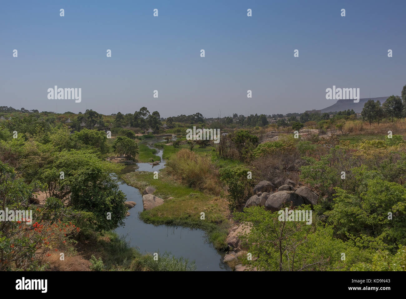 fluent river with rocks and vegetation in Africa. Lubango. Angola Stock ...