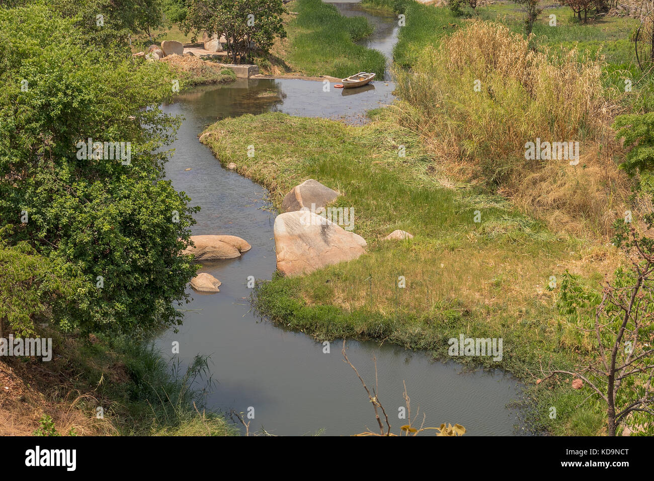 fluent river with rocks and vegetation in Africa. Lubango. Angola Stock ...