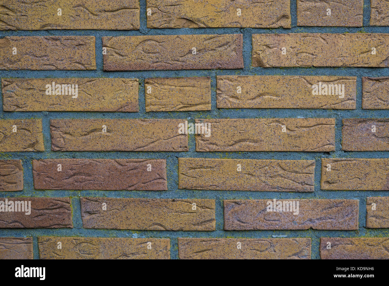 Background of yellow brick wall texture alone Stock Photo - Alamy