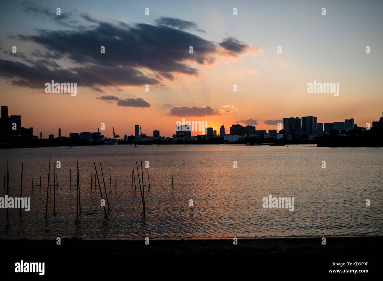 View of a beautiful sunset behind the Tokyo skyline. Photo taken from ...