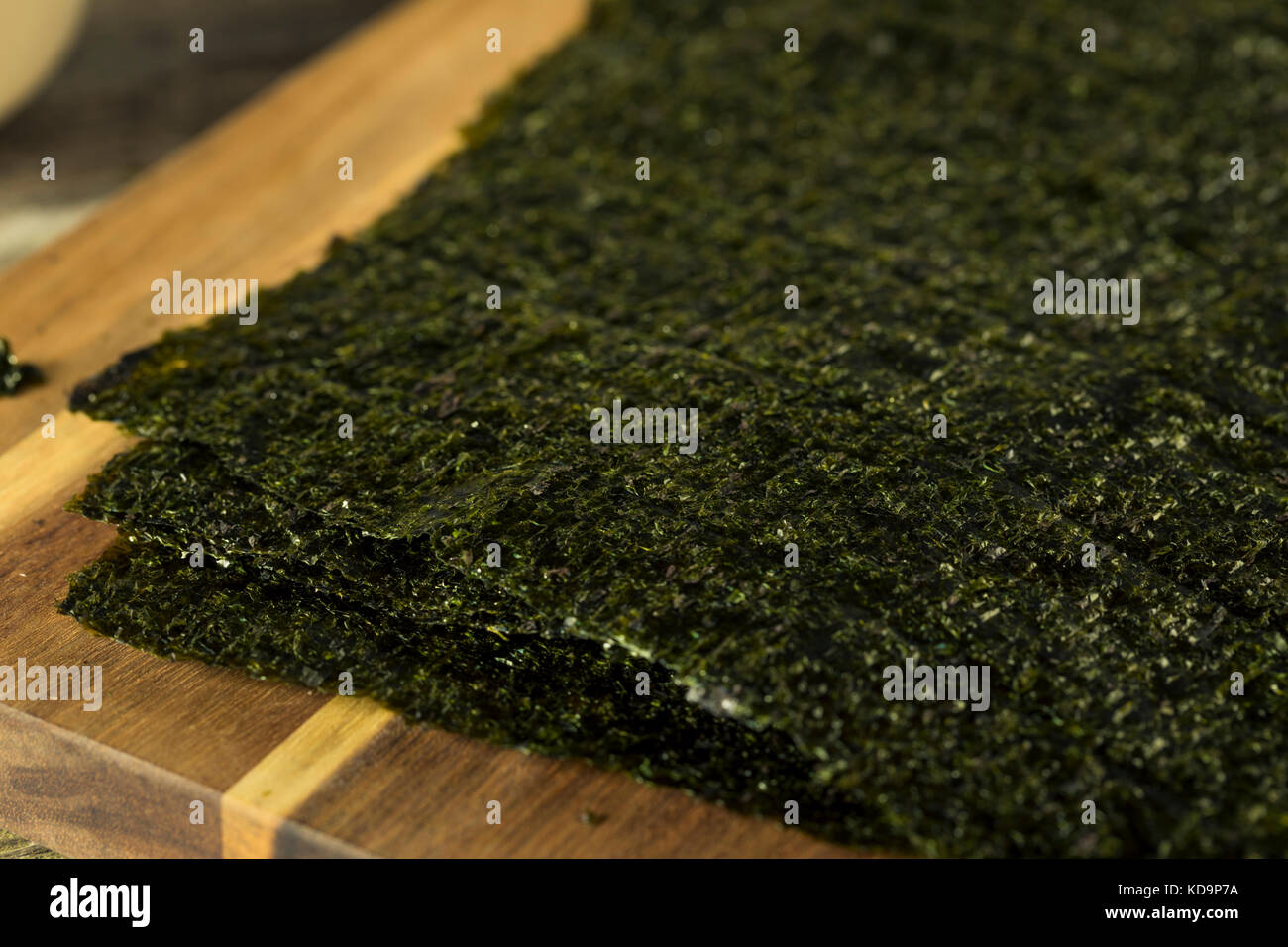 Organic Green Dry Roasted Seaweed Sheets on a Board Stock Photo - Alamy